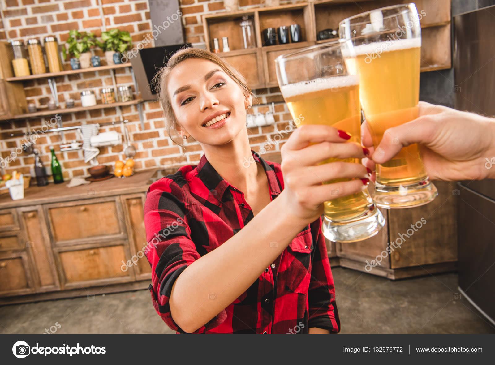 Woman toasting with beer — Stock Photo © DmitryPoch #132676772