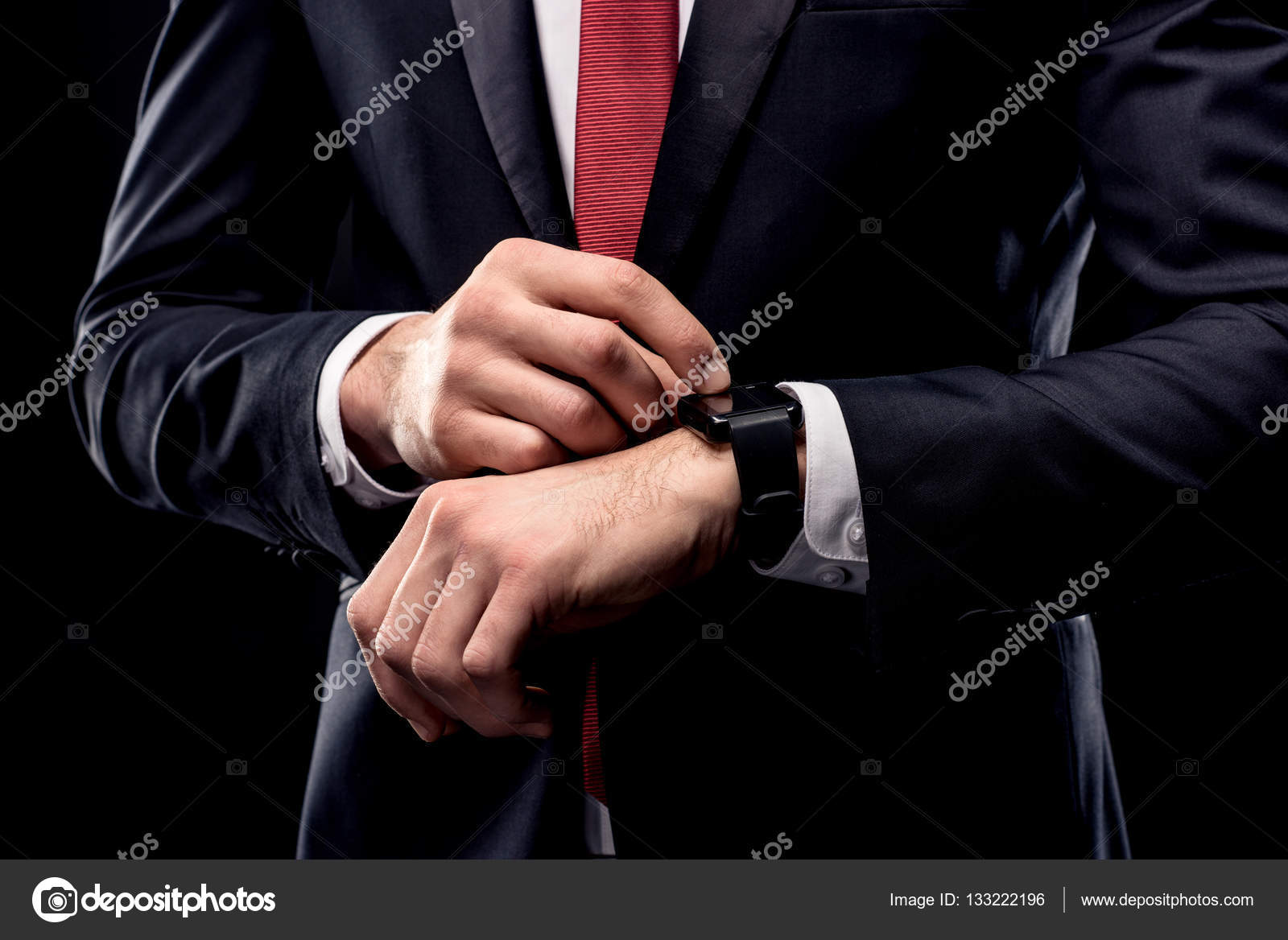 Businessman checking smartwatch — Stock Photo © DmitryPoch #133222196