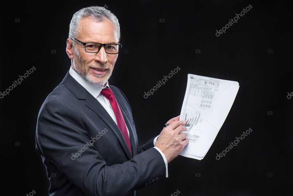 Businessman holding papers — Stock Photo © DmitryPoch #135246026 Businessman holding papers — Stock Photo © DmitryPoch #135246026