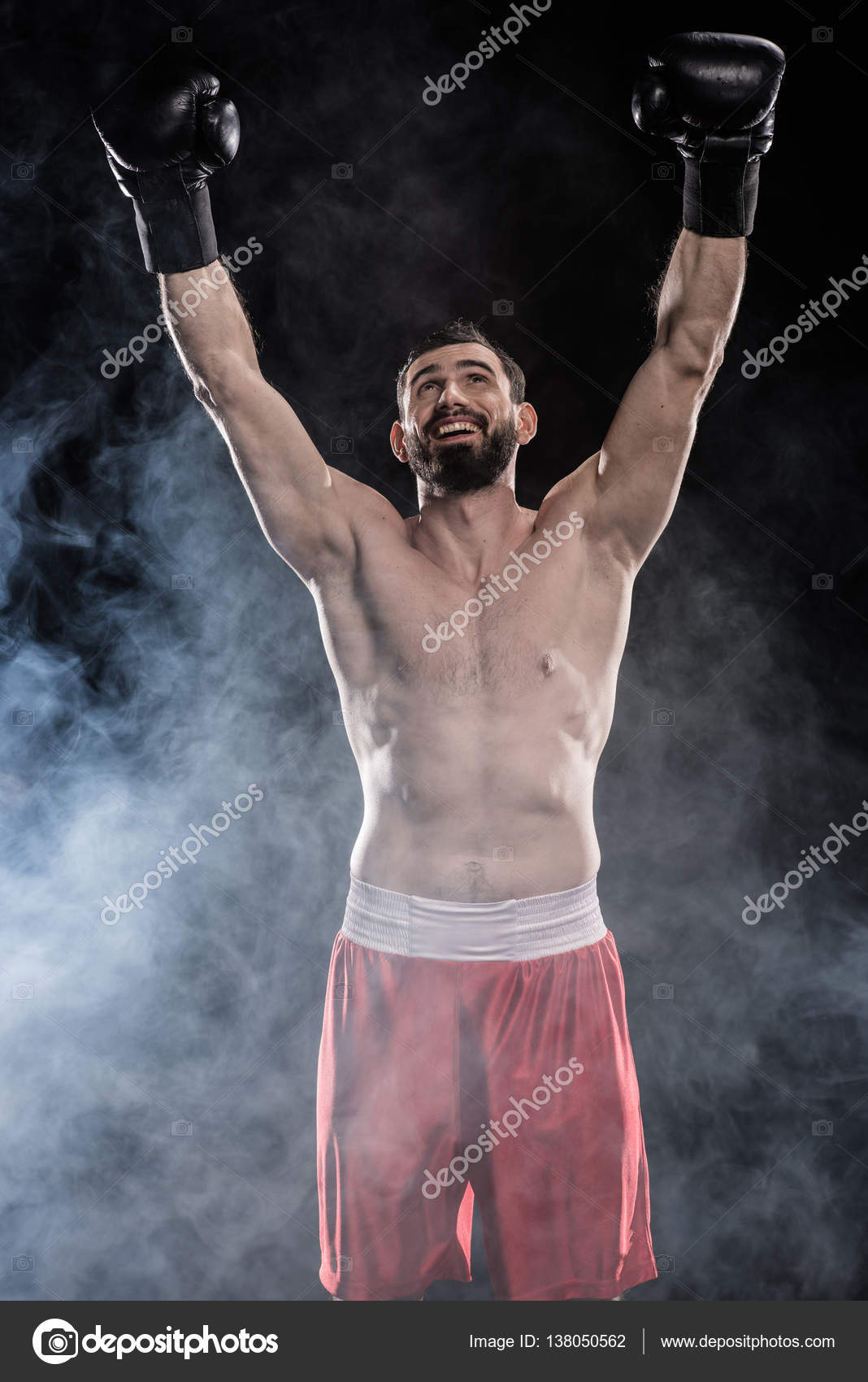 Young boxer celebrating — Stock Photo © DmitryPoch #138050562
