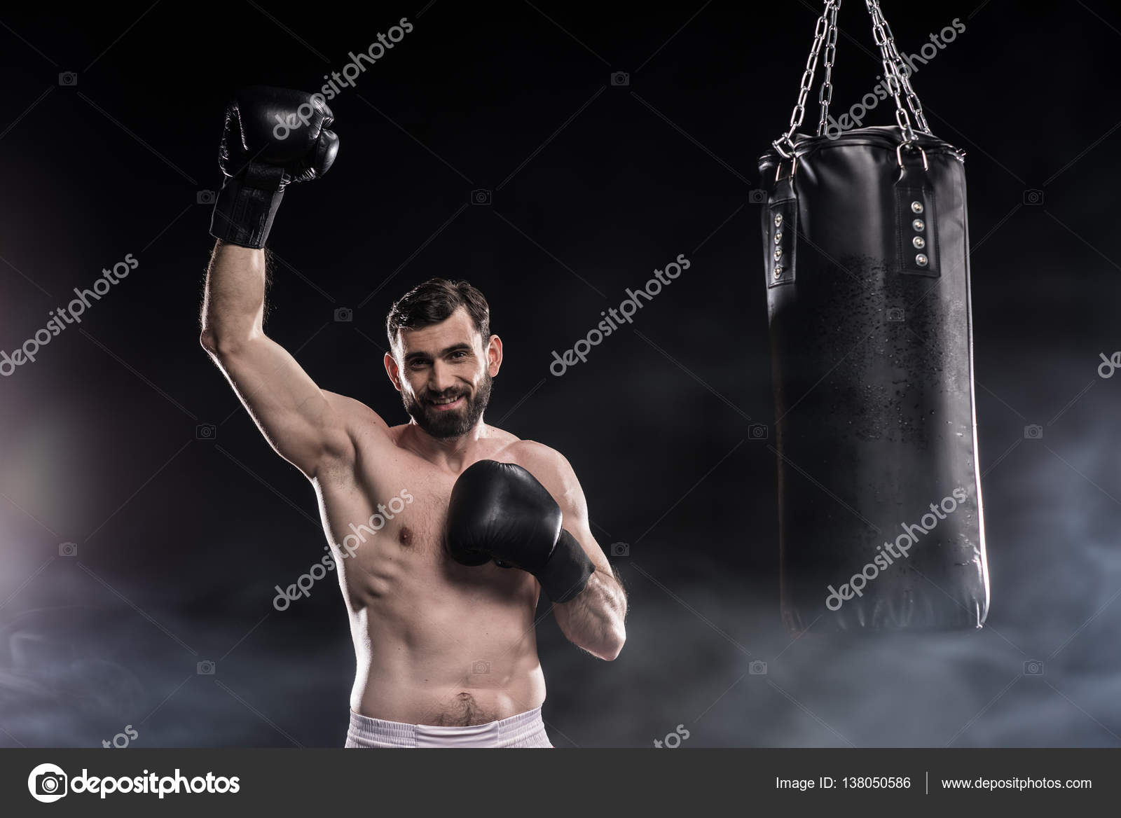Young boxer celebrating — Stock Photo © DmitryPoch #138050586