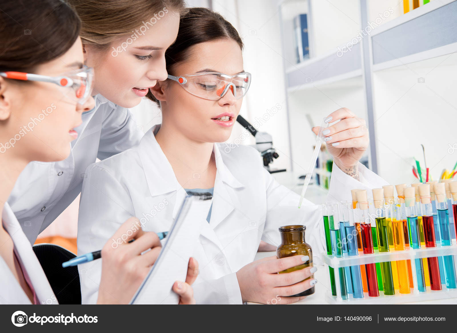 Young female scientists — Stock Photo © DmitryPoch #140490096 Young female scientists — Stock Photo © DmitryPoch #140490096