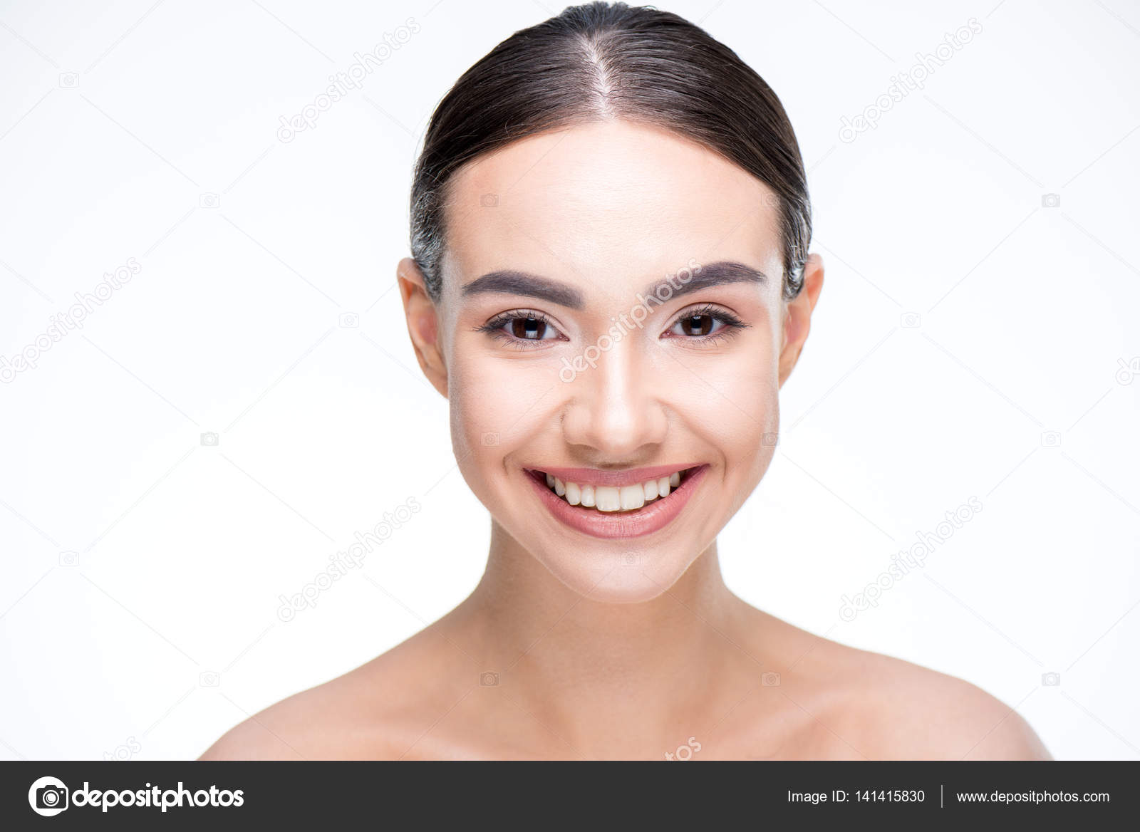 Woman smiling and looking at camera Stock Photo by ©DmitryPoch 141415830