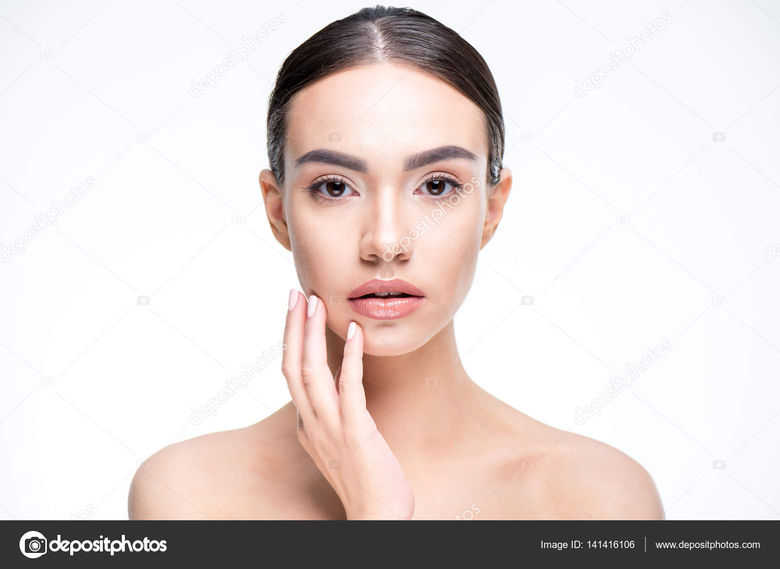 Beautiful woman touching face Stock Photo by ©DmitryPoch 141416106