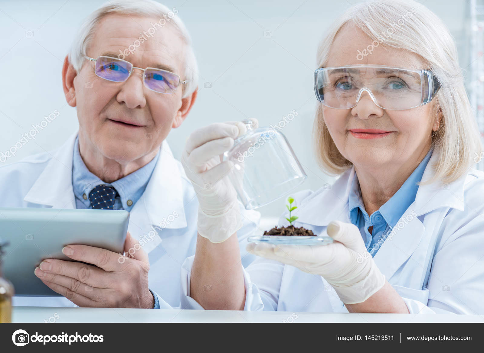Senior couple of scientists — Stock Photo © DmitryPoch #145213511