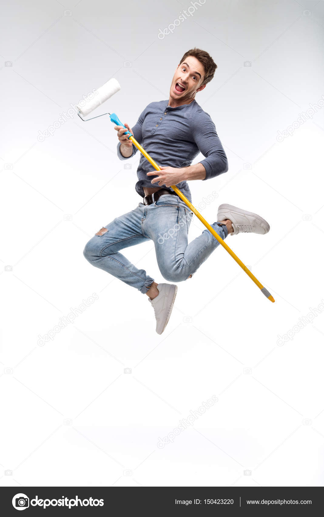 Man holding paint roller — Stock Photo © DmitryPoch #150423220