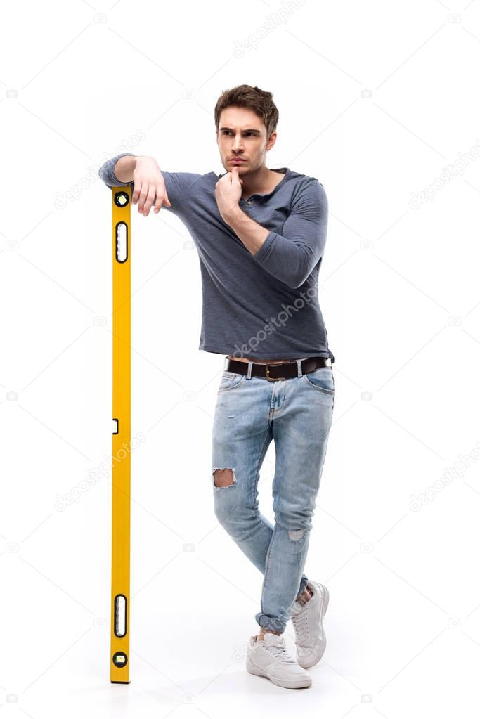 Man holding building level — Stock Photo © DmitryPoch #150421838