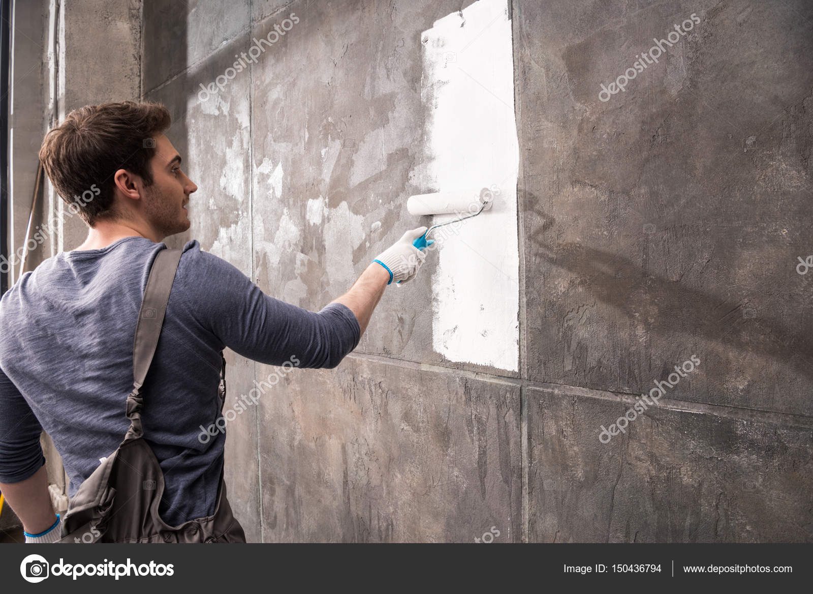 Man painting wall — Stock Photo © DmitryPoch #150436794