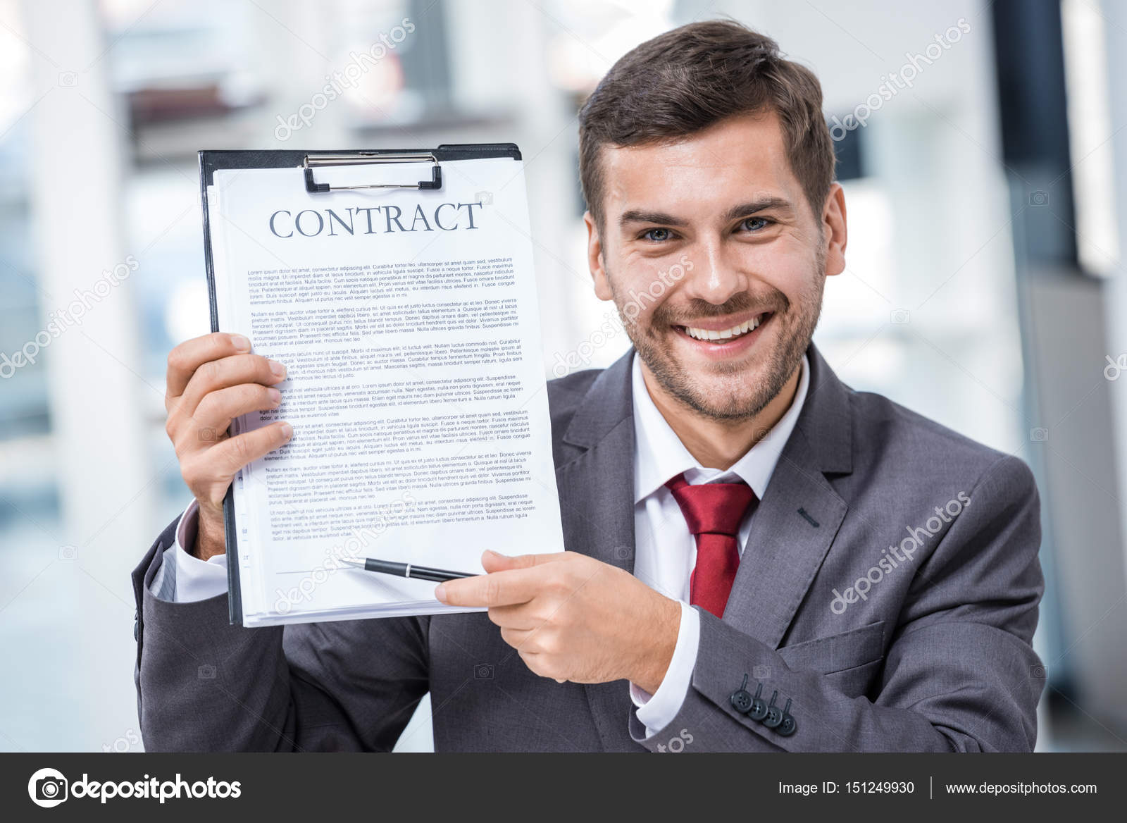 Businessman holding contract — Stock Photo © DmitryPoch #151249930