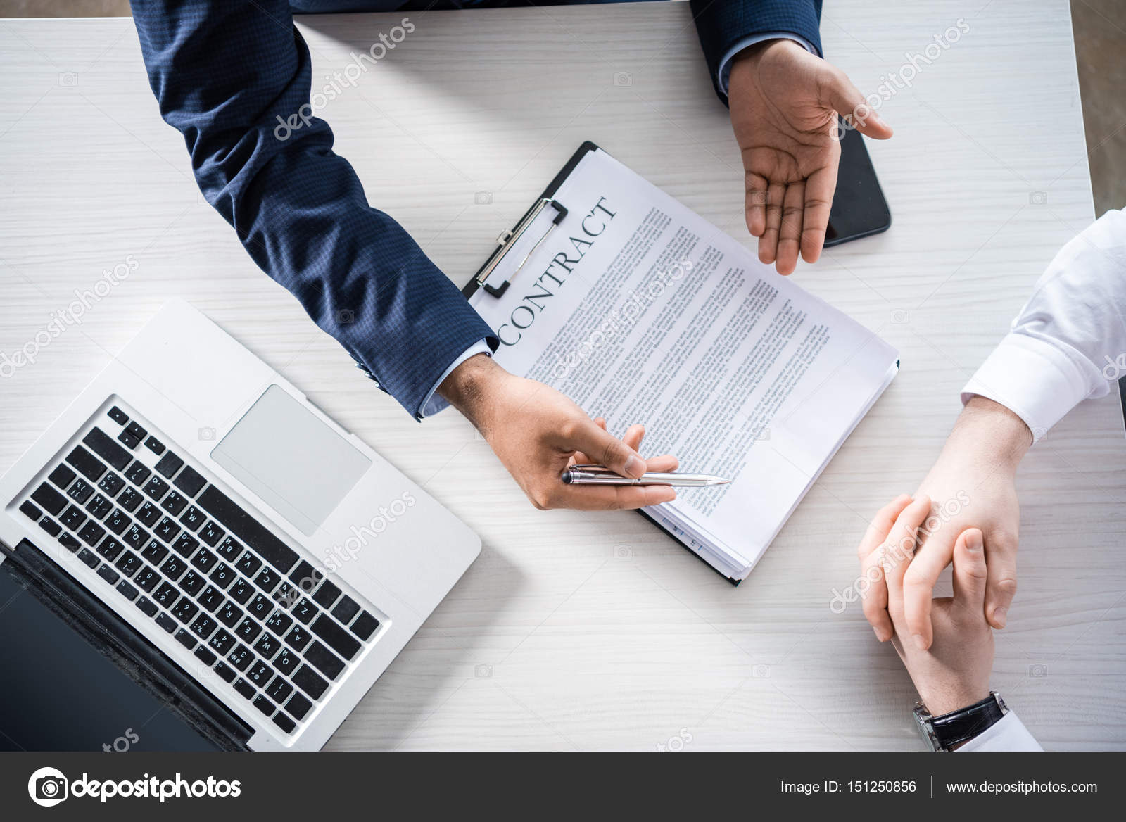Businessmen discussing contract — Stock Photo © DmitryPoch #151250856