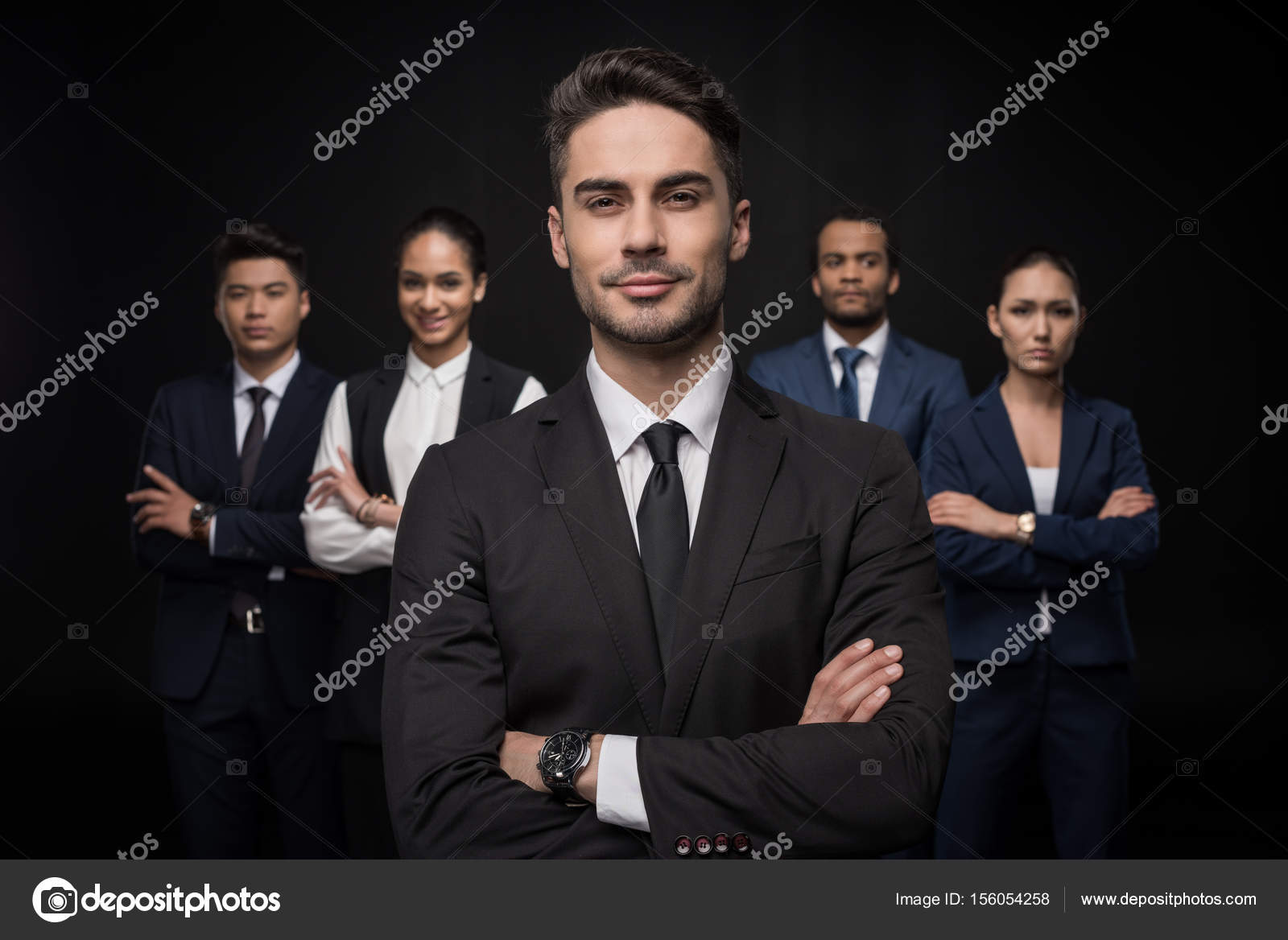 Confident businessman with his colleagues Stock Photo by ©DmitryPoch ...