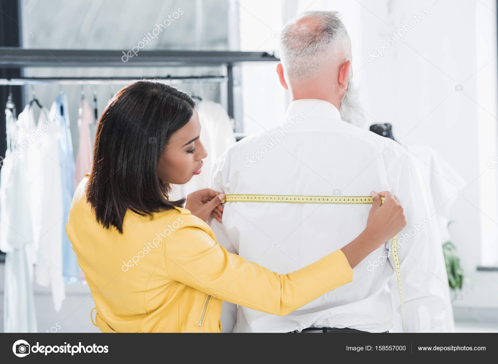 Tailor measuring elderly man — Stock Photo © DmitryPoch #158557000