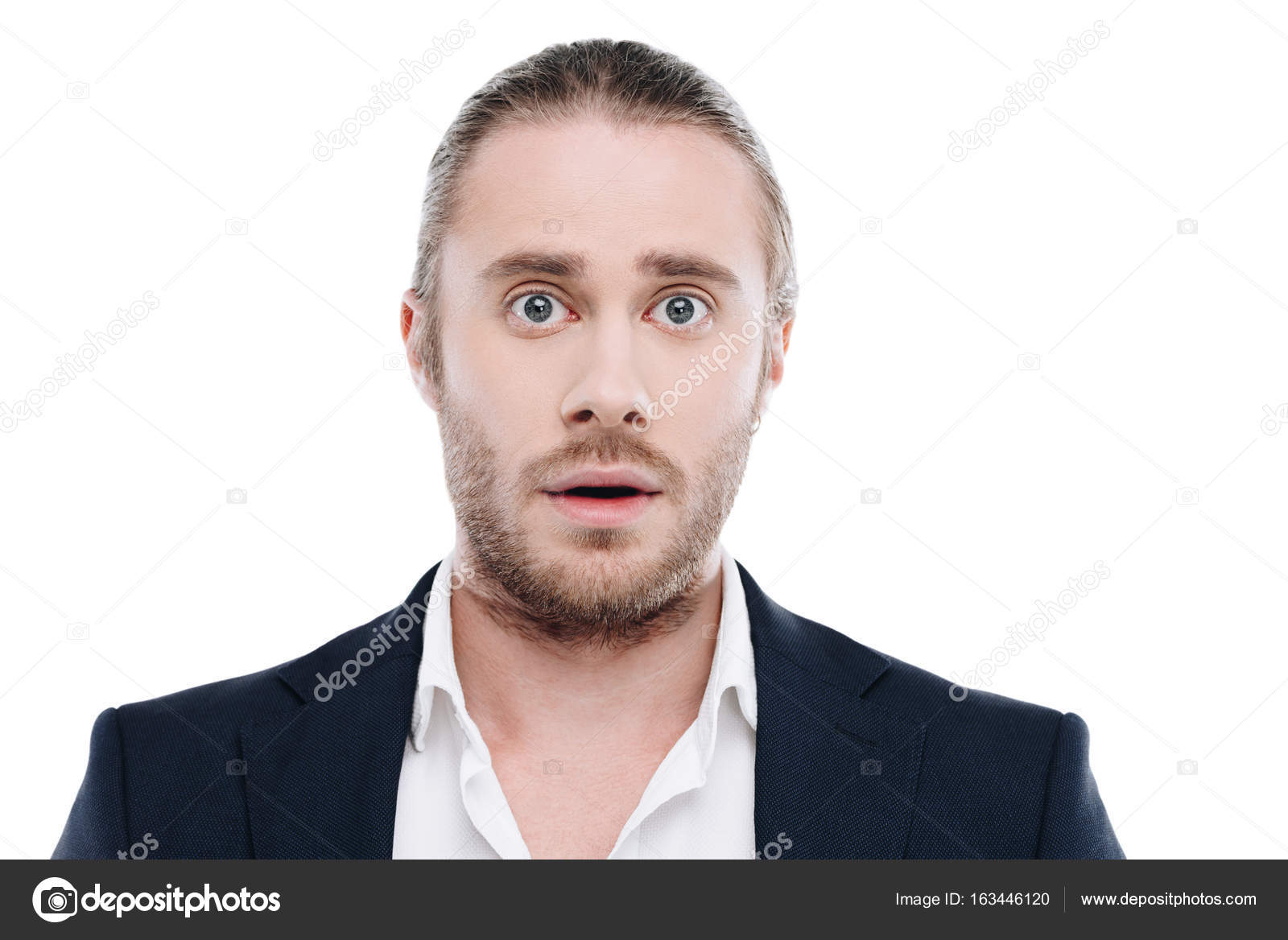 Handsome shocked businessman — Stock Photo © DmitryPoch #163446120
