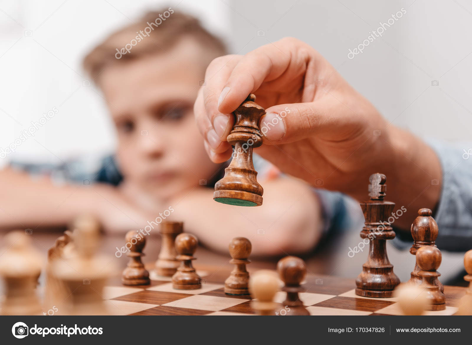 Man holding chess piece — Stock Photo © DmitryPoch #170347826