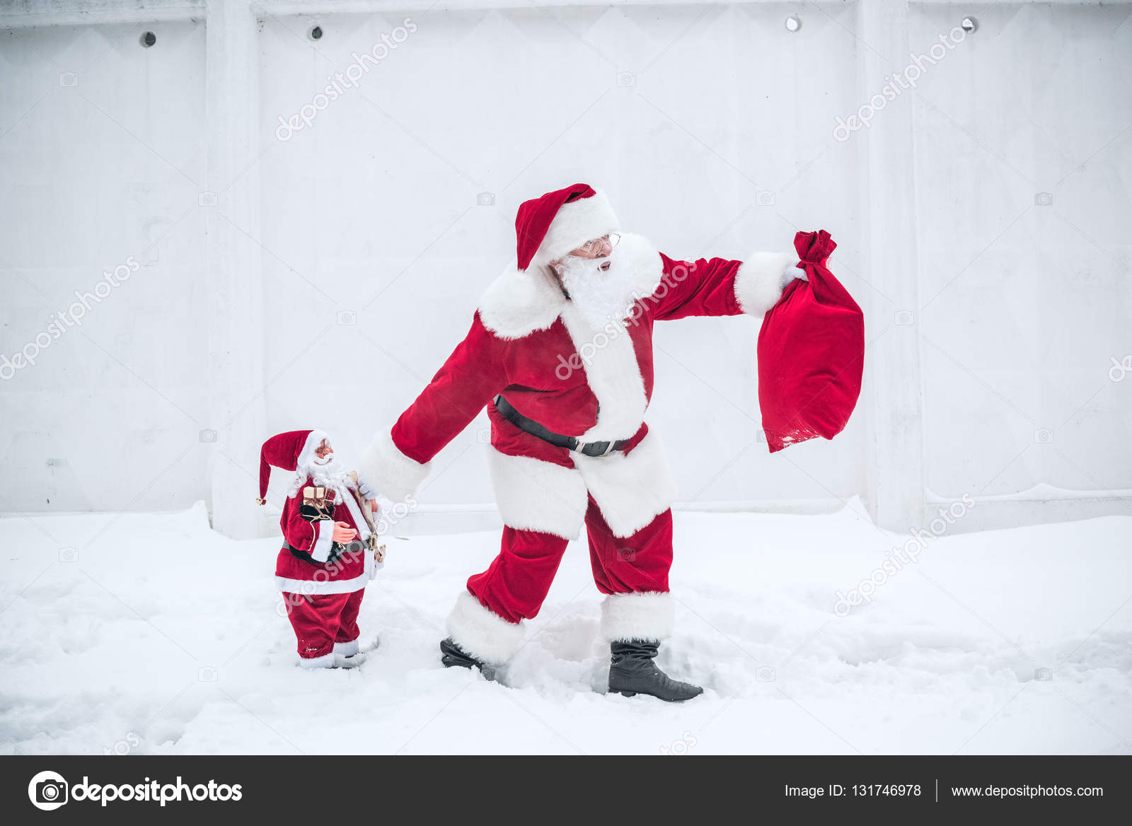 Santa Claus walking with little Santa — Free Stock Photo © AndrewLobov ...