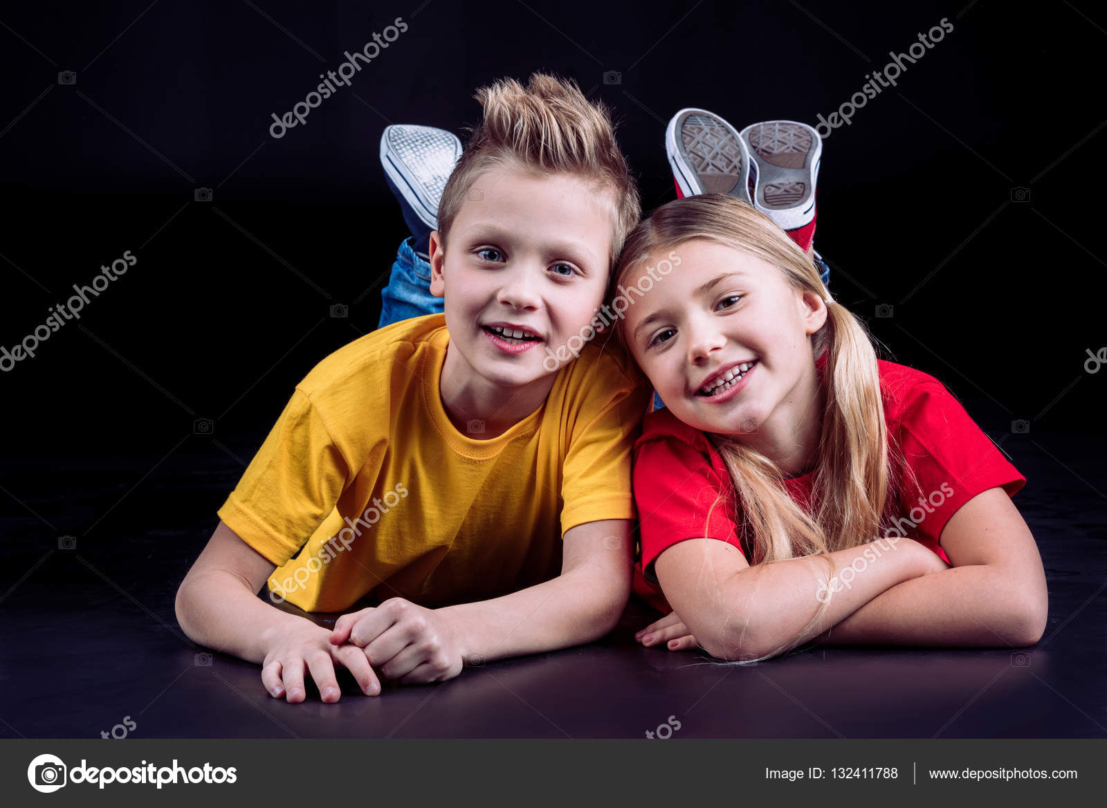 Happy siblings smiling at camera — Stock Photo © AndrewLobov #132411788