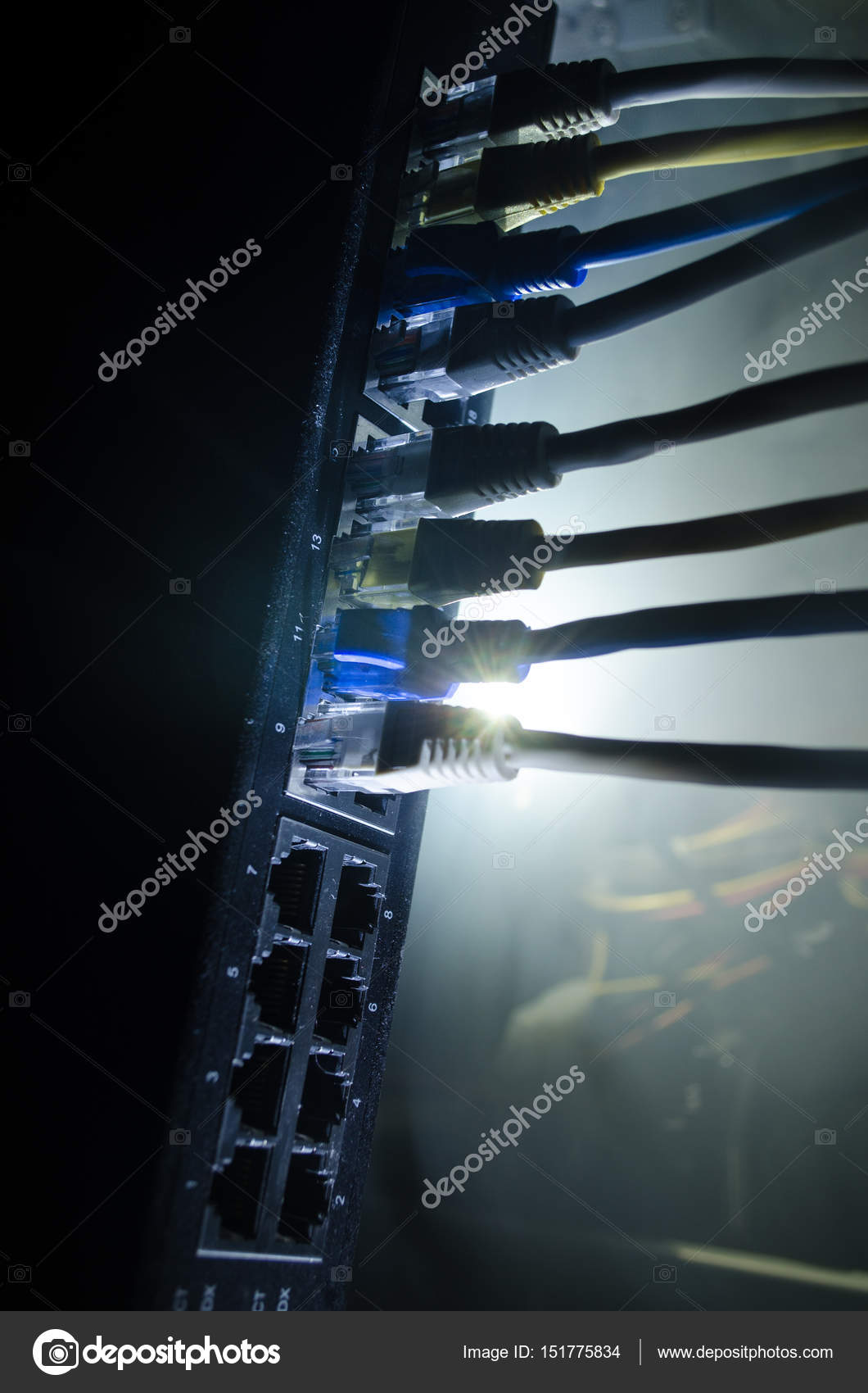 Network switch and ethernet cables, symbol of global communications ...