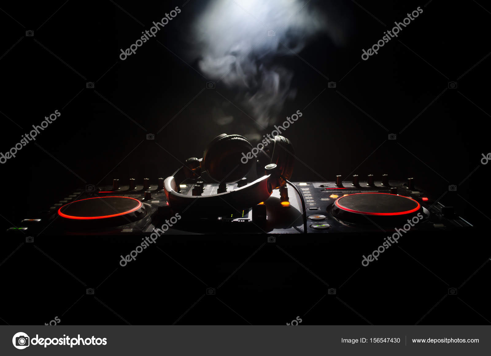 DJ Spinning, Mixing, and Scratching in a Night Club, Hands of dj tweak ...