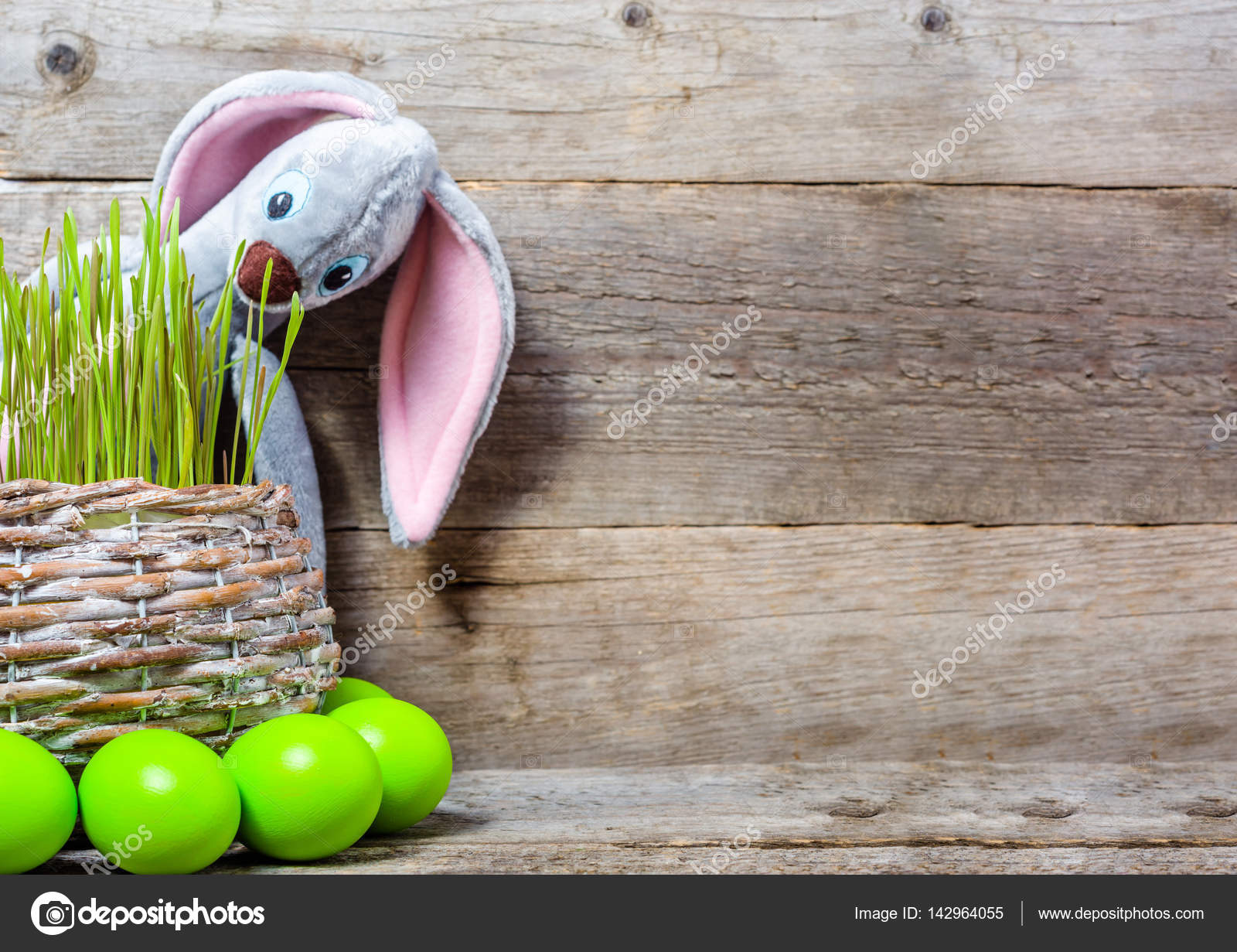Easter rabbit in grass and easter eggs, background, spring symbols ...