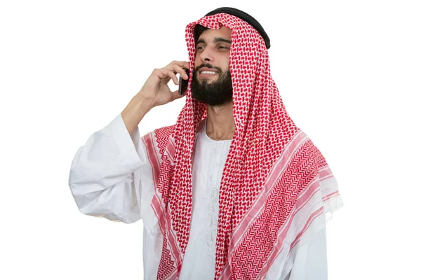 Arab saudi operator man working with free hands headset on the phone ...