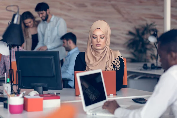 Arabic woman working in office. - Stock Image - Everypixel