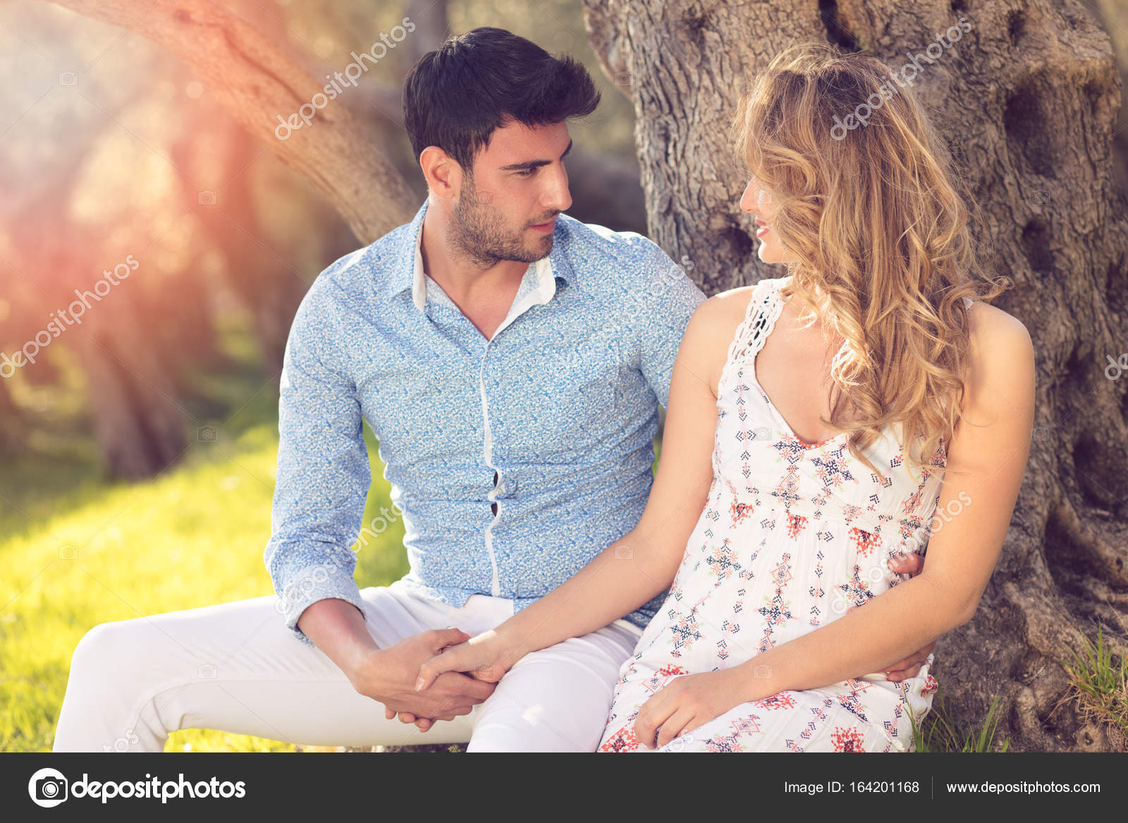 Happy couple under big tree Stock Photo by ©FS-Stock 164201168