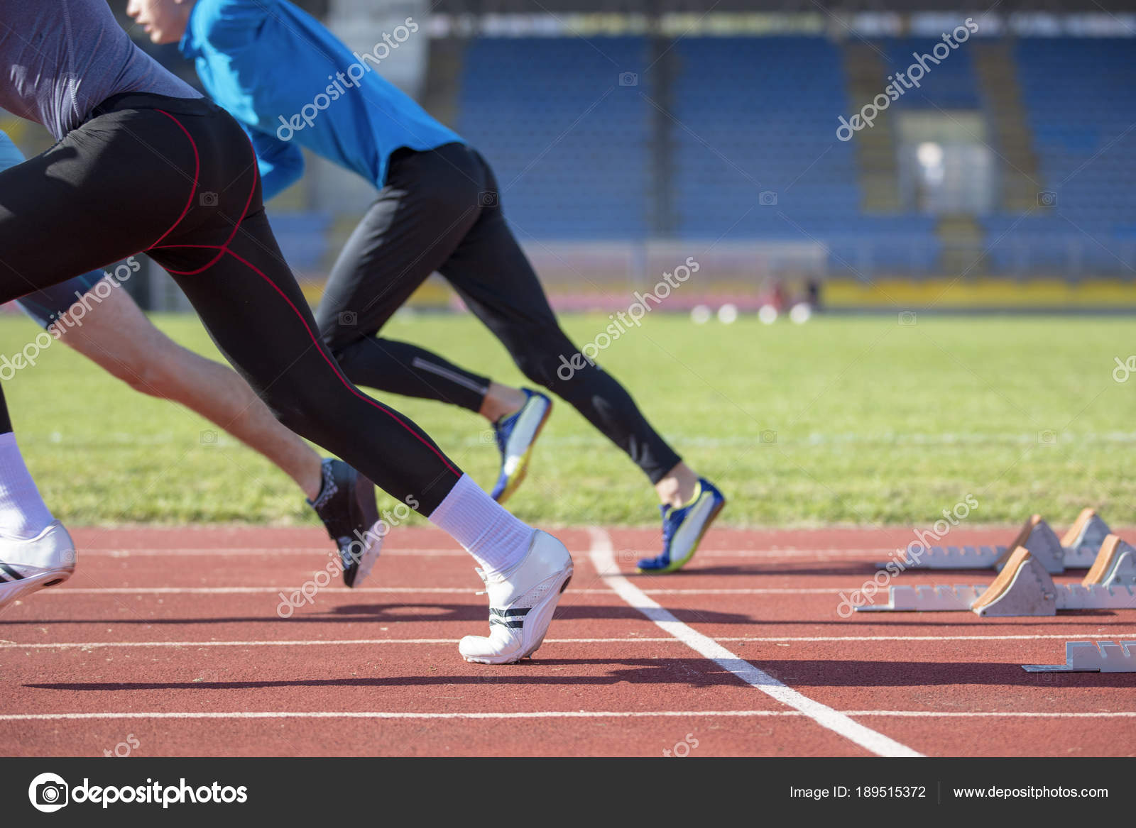 Athletes at the sprint start line in track and field Stock Photo by ©FS ...