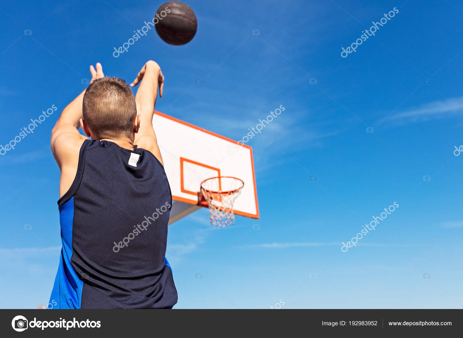 Person Shooting Basketball