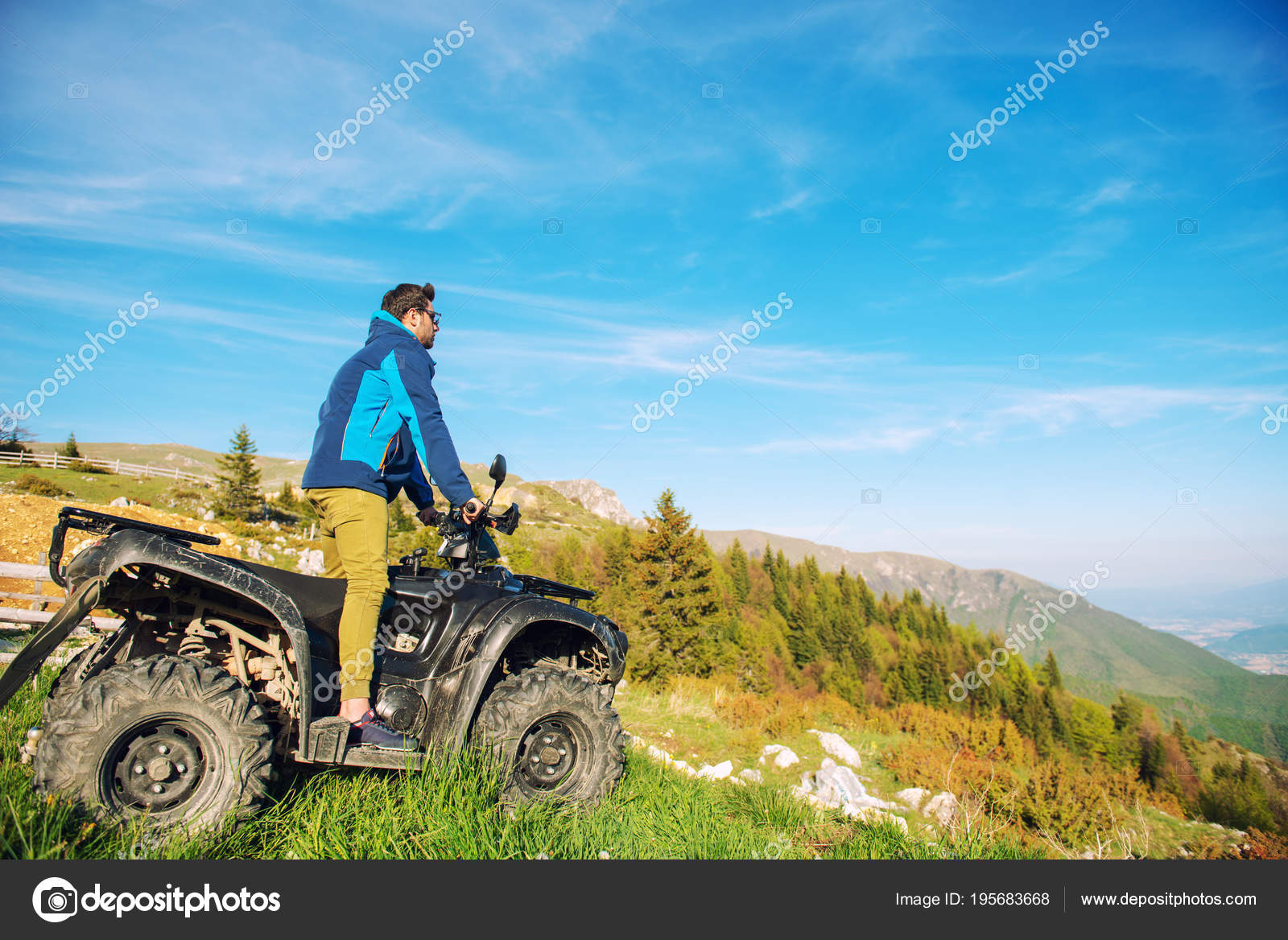 Man on the ATV Quad Bike on the mountains road. Stock Photo by ©FS ...
