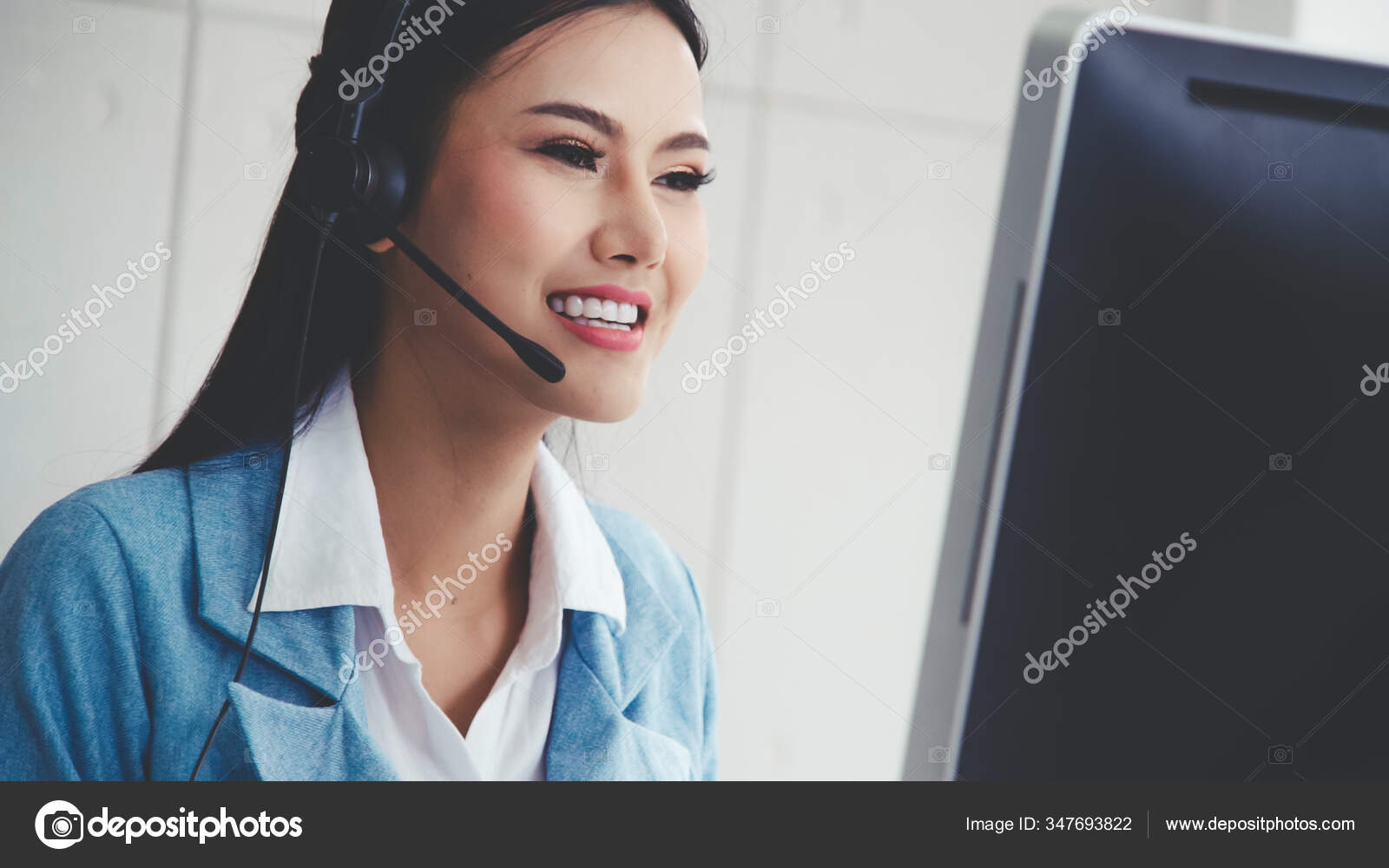 Download - Customer support agent or call center with headset works on ...